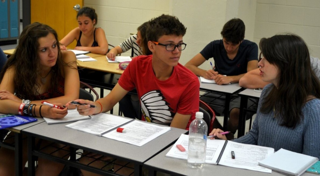 Students. Image Credit. Quest Language Studies. Flickr. Public domain